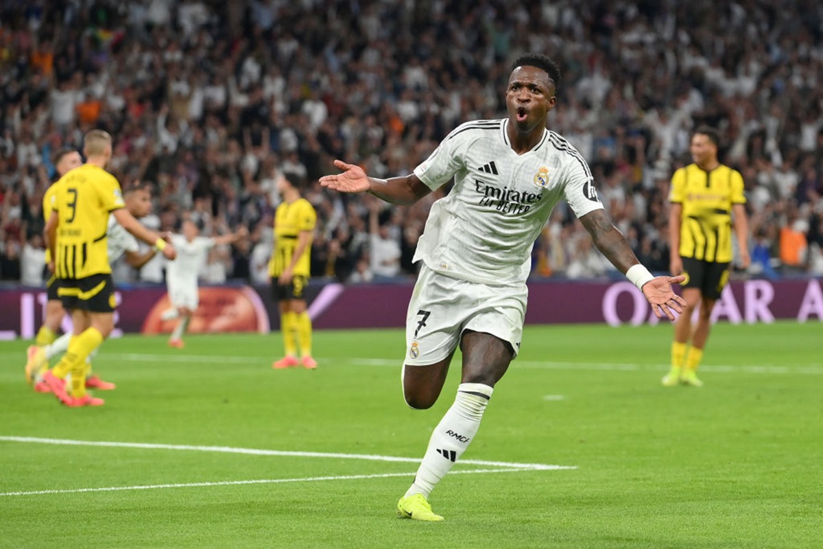 Rumo à Bola de Ouro! Vini Jr. marca três vezes e Real bate Dortmund ...